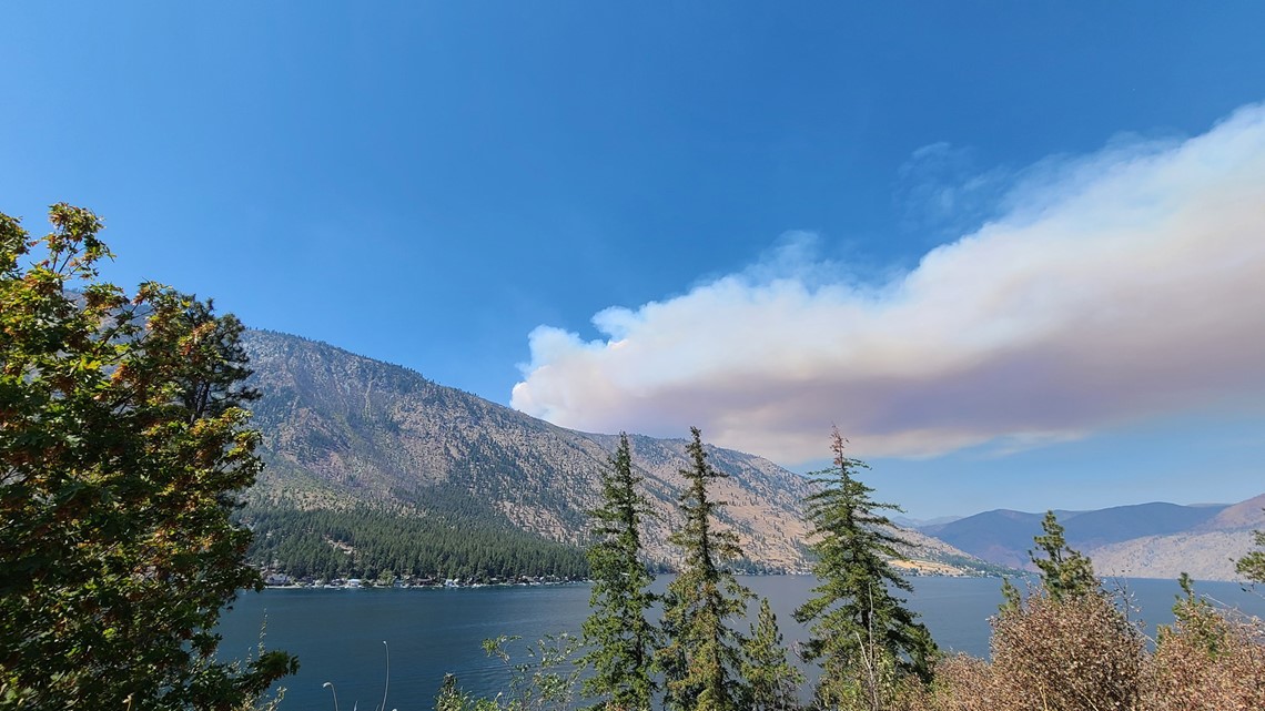 Wildfire evacuation orders downgraded for residents near Lake Chelan ...