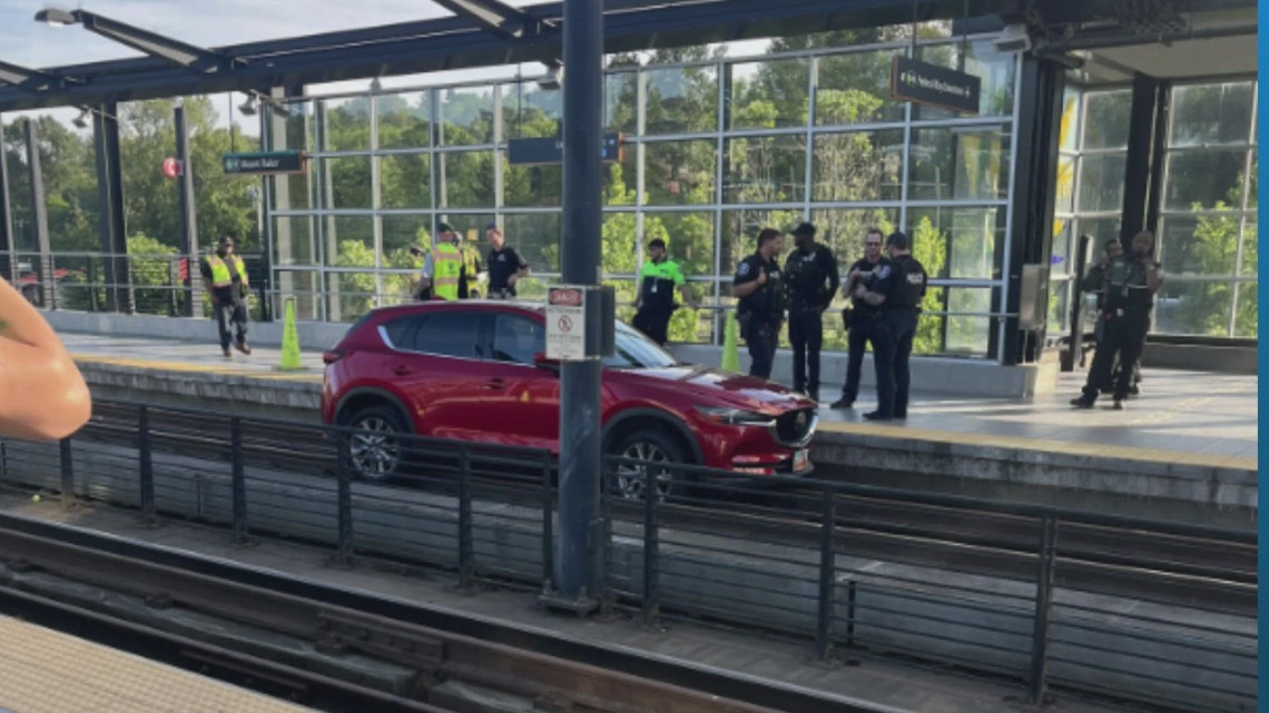 Car drives onto elevated light rail tracks in Seattle | krem.com