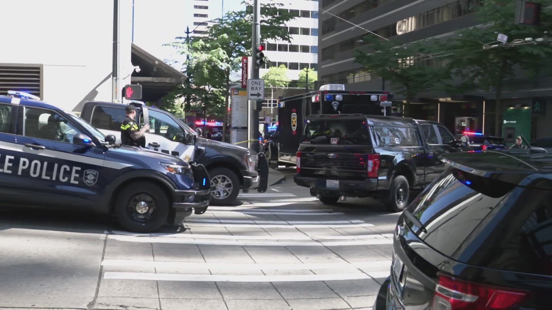Armed woman taken into custody after standoff at Seattle FBI building ...