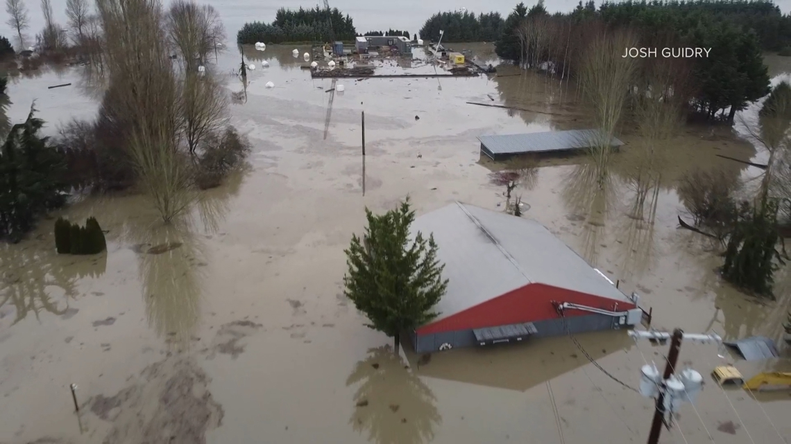 Looters in kayaks target flooded Snohomish farm as historic flooding ...
