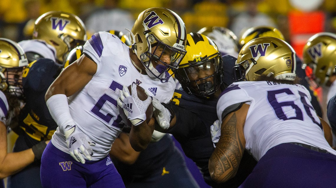 Series history between UW, Michigan football | krem.com