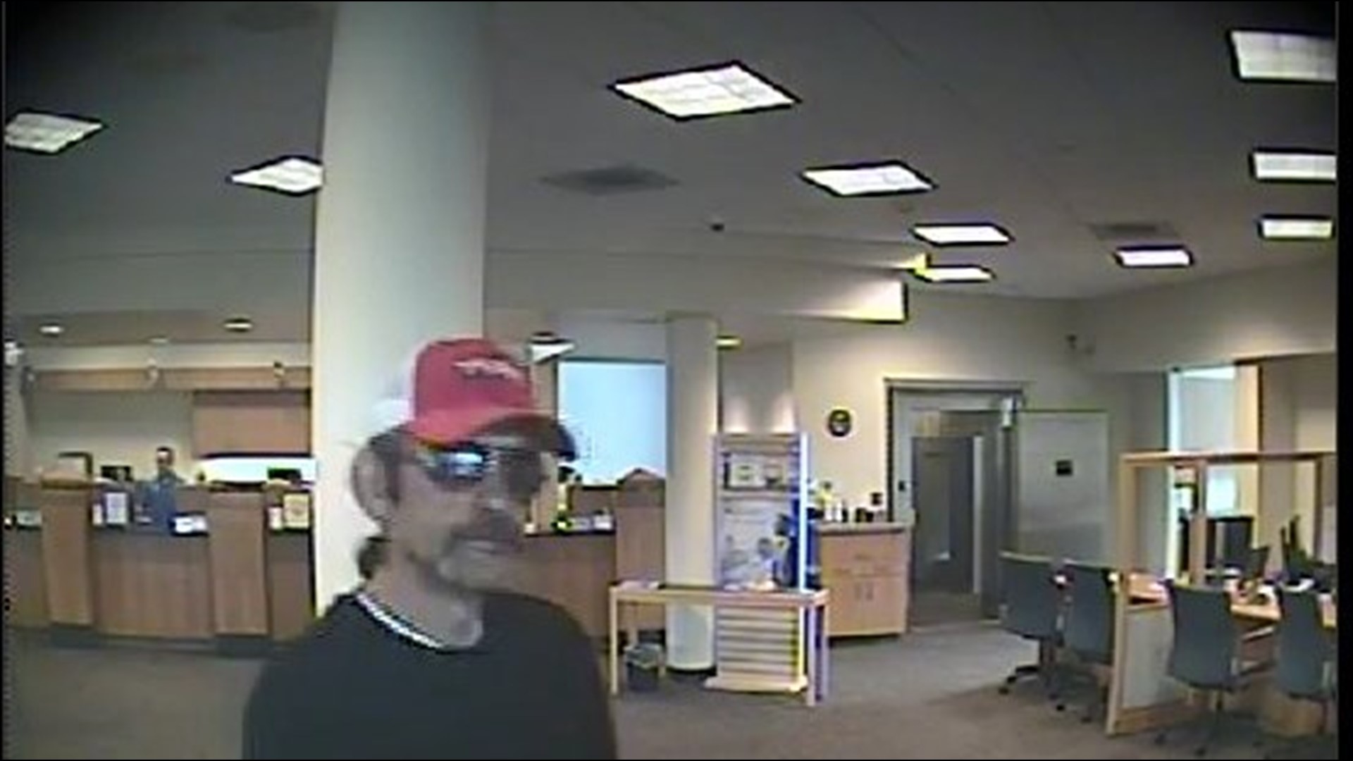 Police search for suspect who robbed N. Spokane bank | krem.com