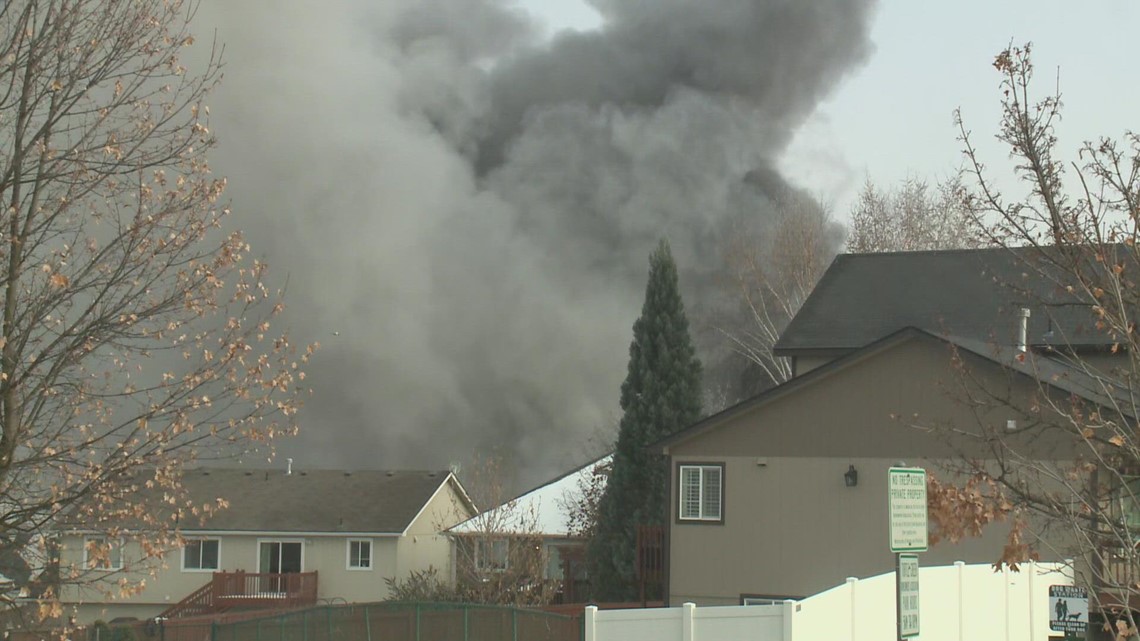 House catches fire on scene of SWAT standoff in Spokane County | krem.com