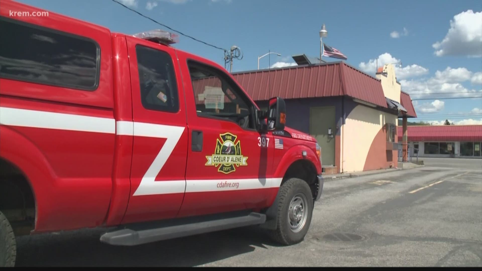 CDA Fire calls in ladder truck to fix upside-down American flag | krem.com