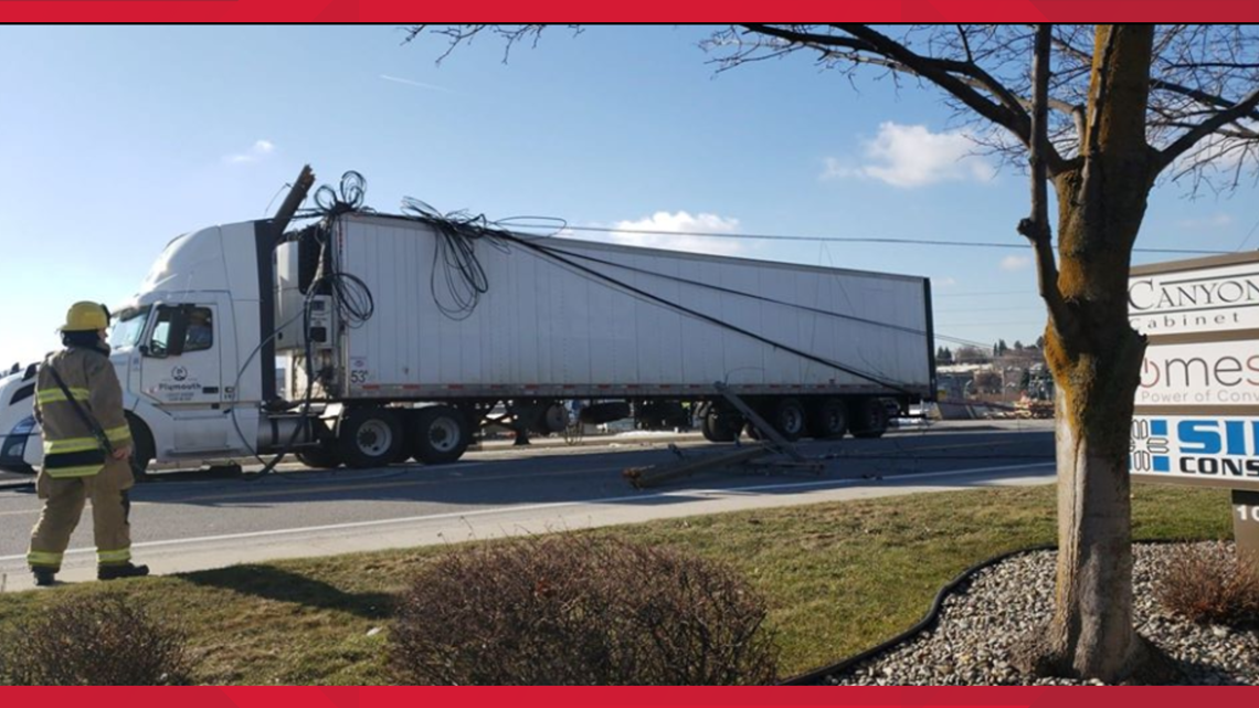 Semi-truck knocks down power lines in Spokane Valley | krem.com