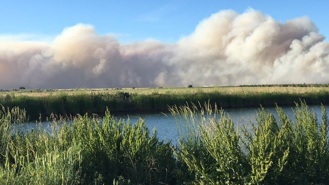 Grant County wildfire 85 percent contained, cause under investigation ...