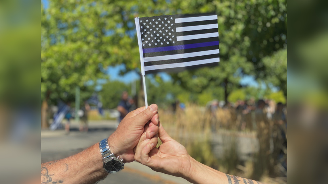 'Defend, not defund': Back the Blue supporters counter-protest rally to ...