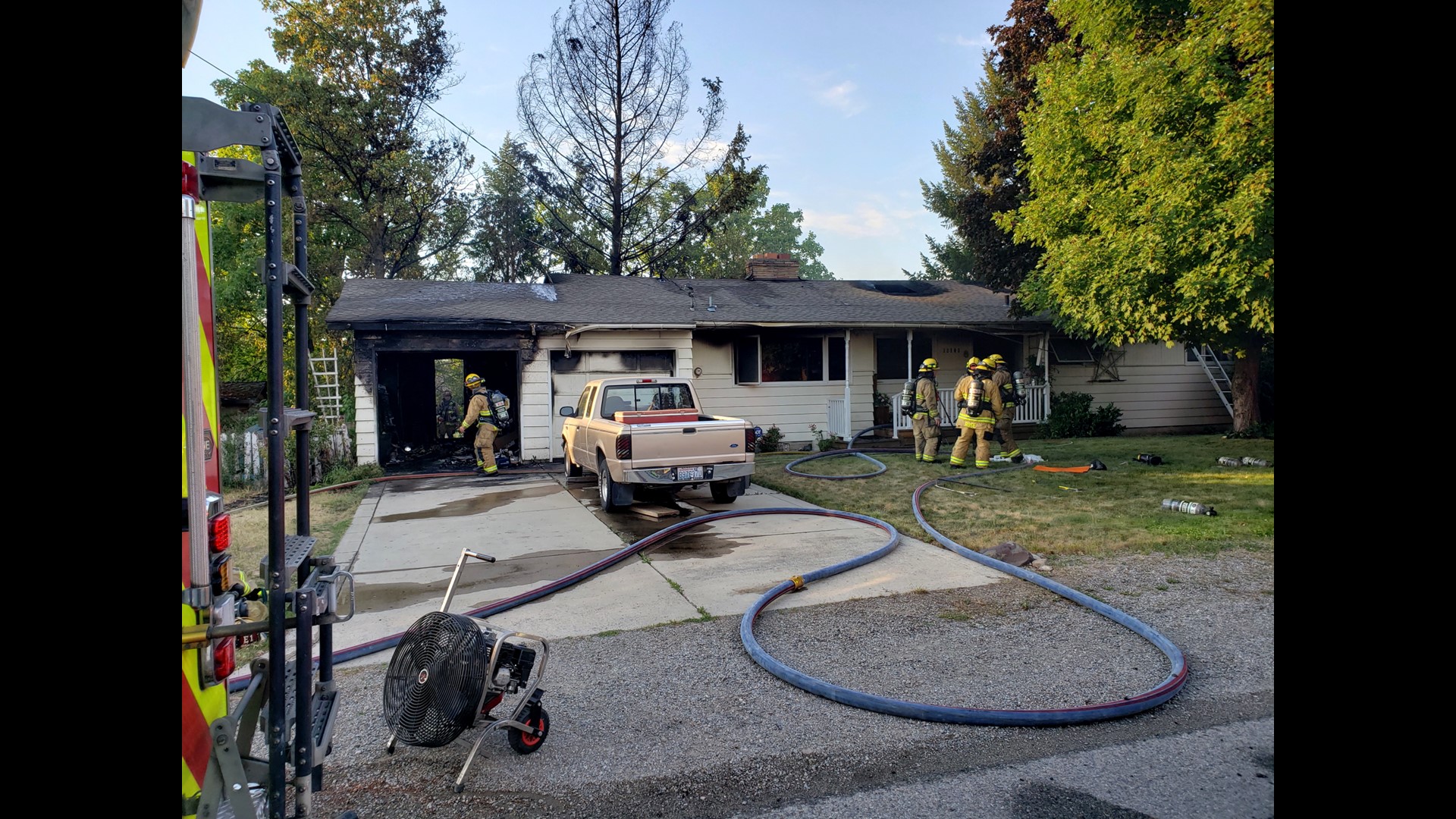 Spokane Valley neighbors help elderly couple escape house fire | krem.com