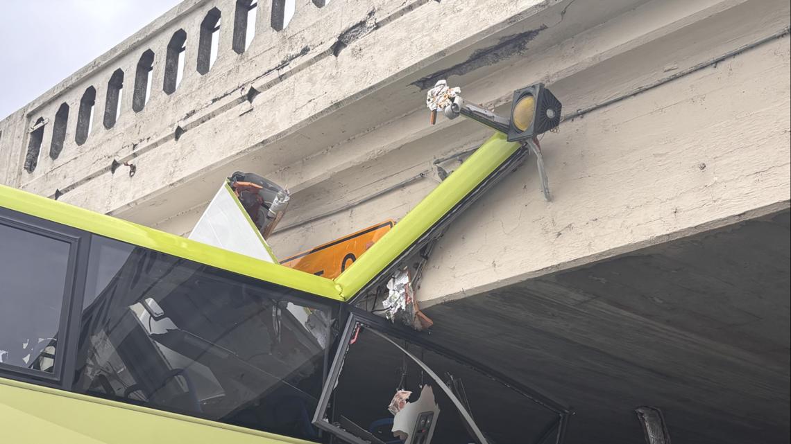 Spokane double-decker bus collides with railroad viaduct; four ...