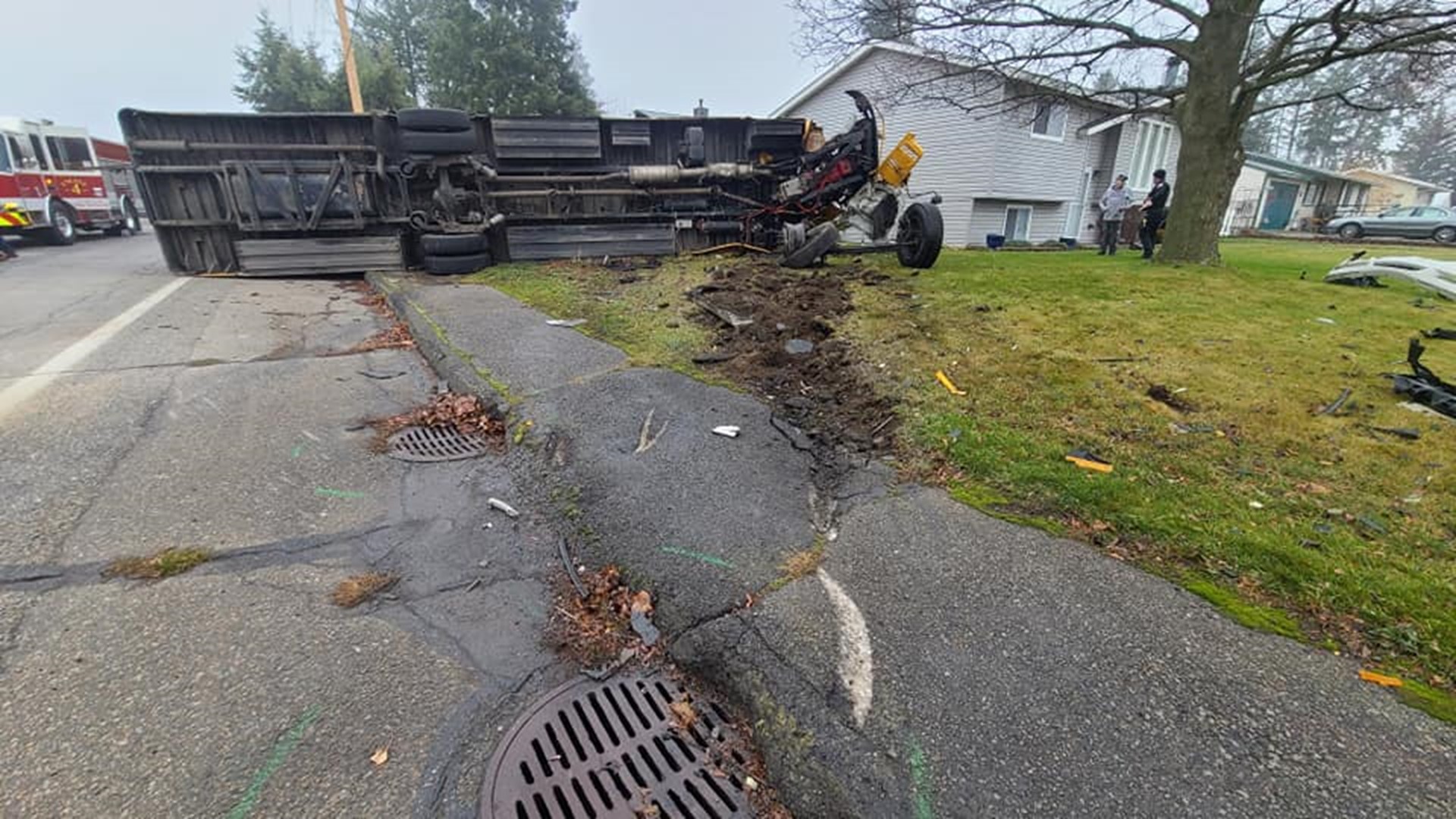 School bus flips over after Otis Orchards car crash | krem.com