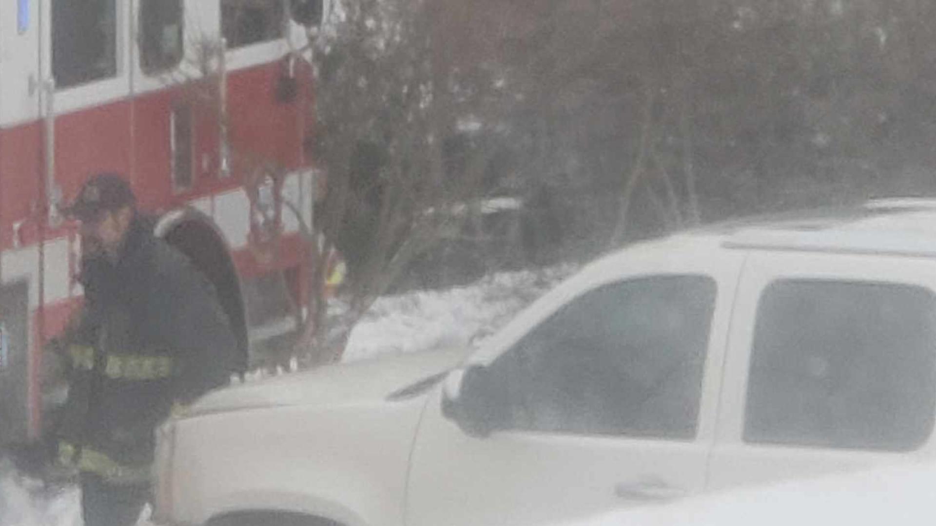 Two Spokane Fire Department trucks slide down hill during fire alarm ...