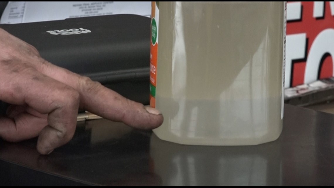 Spokane drivers accuse stations of pumping out water with fuel | krem.com