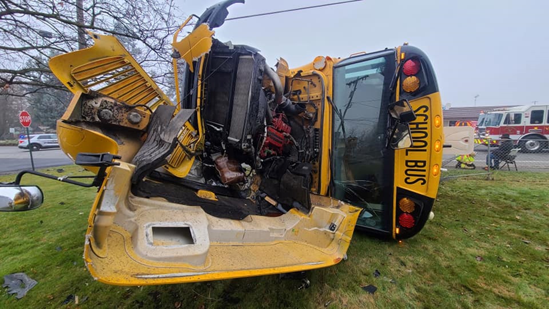 School bus flips over after Otis Orchards car crash | krem.com