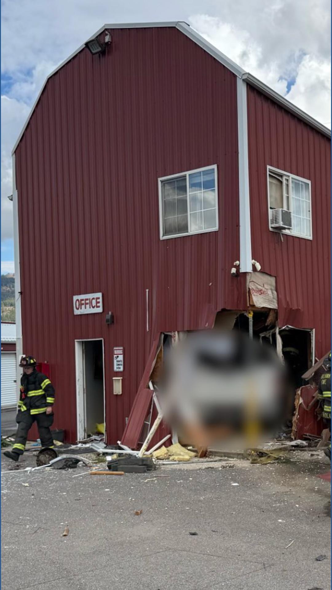 Firefighters rescue 2 after car crashes into building in Sagle | krem.com