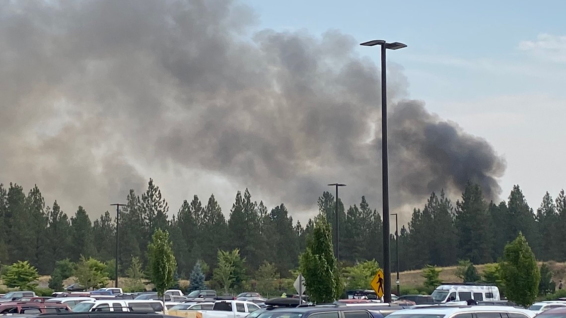 Crews contain wildfire burning on E. Graves Road south of Costco | krem.com