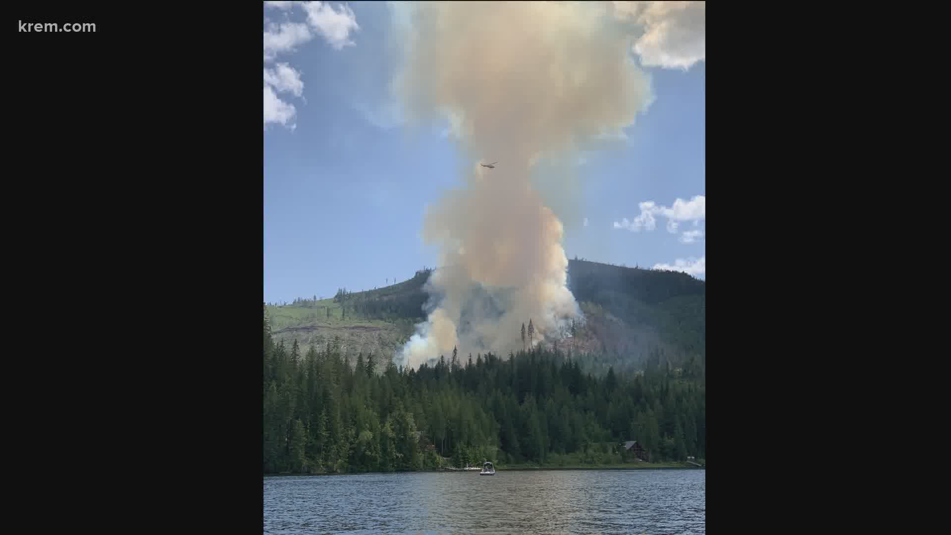 Crews battle fire burning in Spirit Lake near Bronze Bay | krem.com