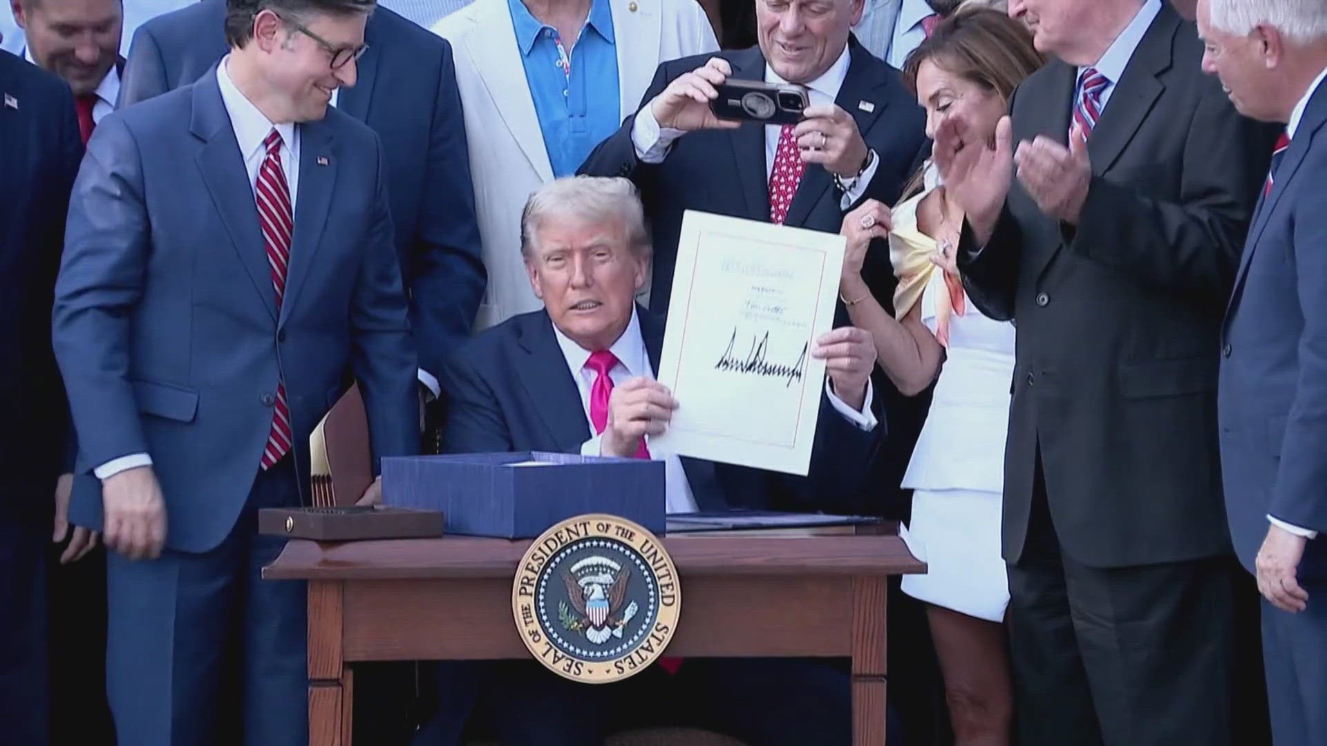 Trump signs his tax and spending cut bill at the White House July 4 ...