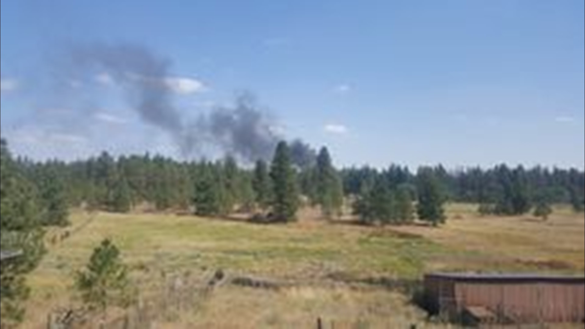 House fire turns into brush fire in near Cheney | krem.com