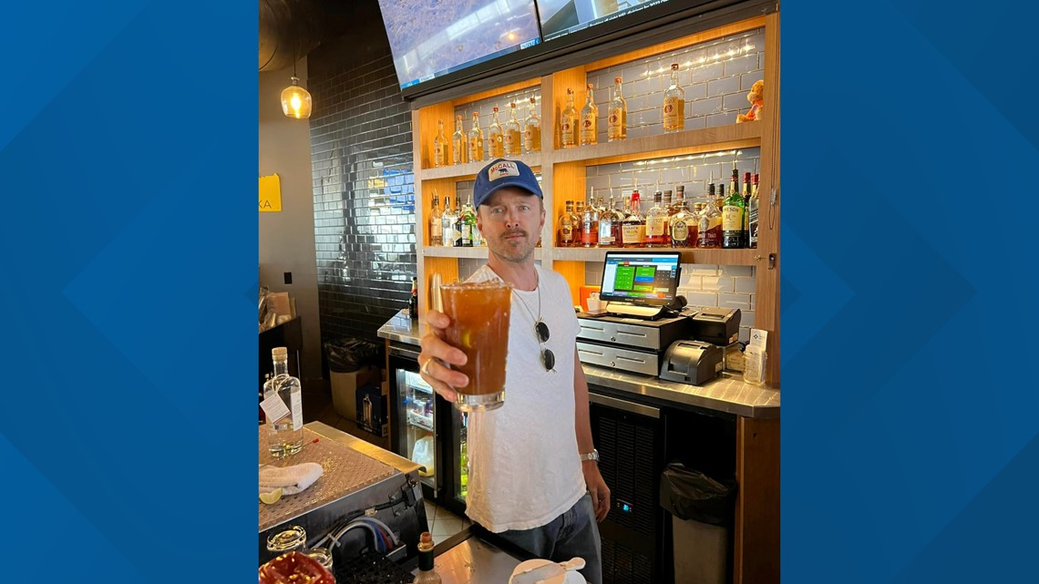 Aaron Paul sends drinks flying at the Boise Airport | krem.com